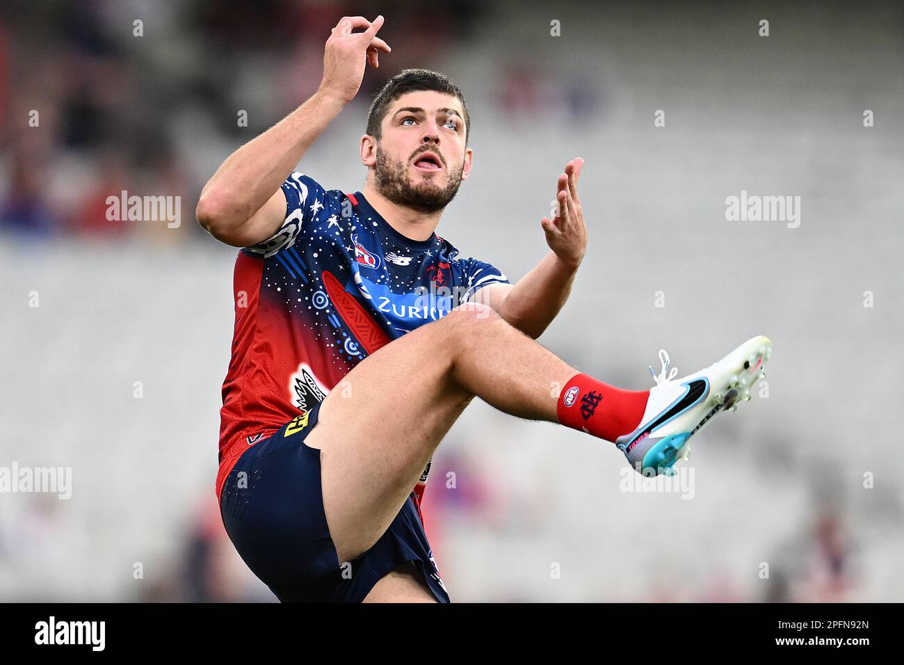 Angus Brayshaw of Melbourne warms up during the AFL Round 1 match ...