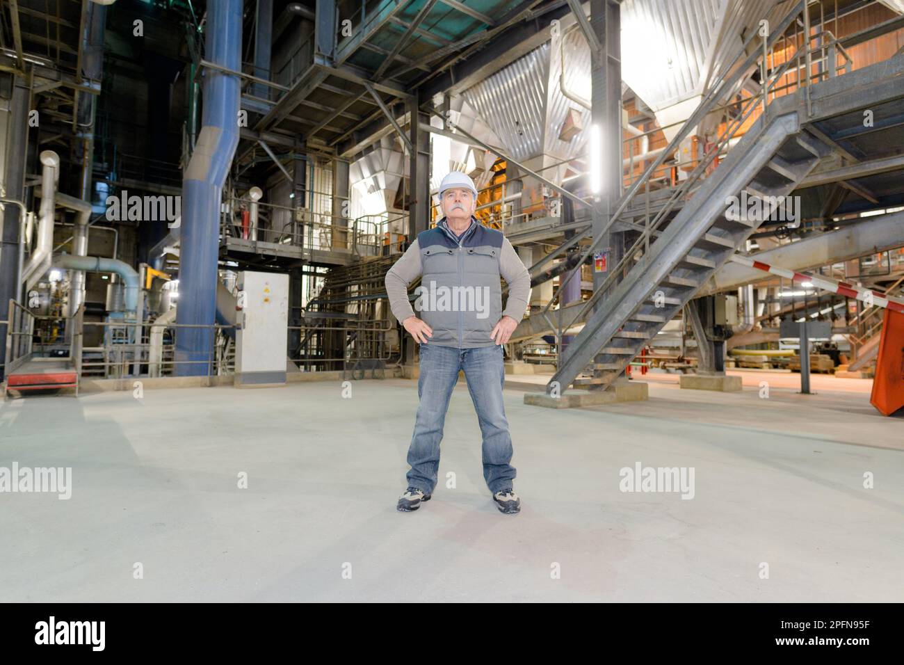 portrait of an industrial plant worker posing Stock Photo - Alamy