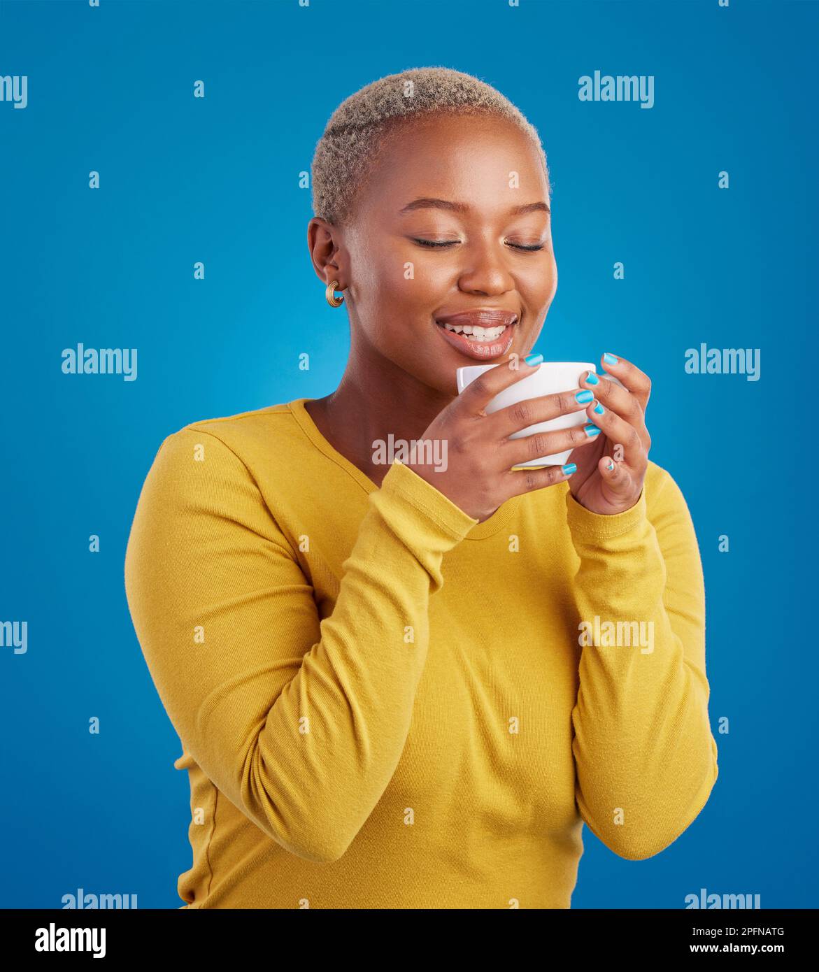 Black woman, happy and coffee or tea smell in studio with a smile and ...