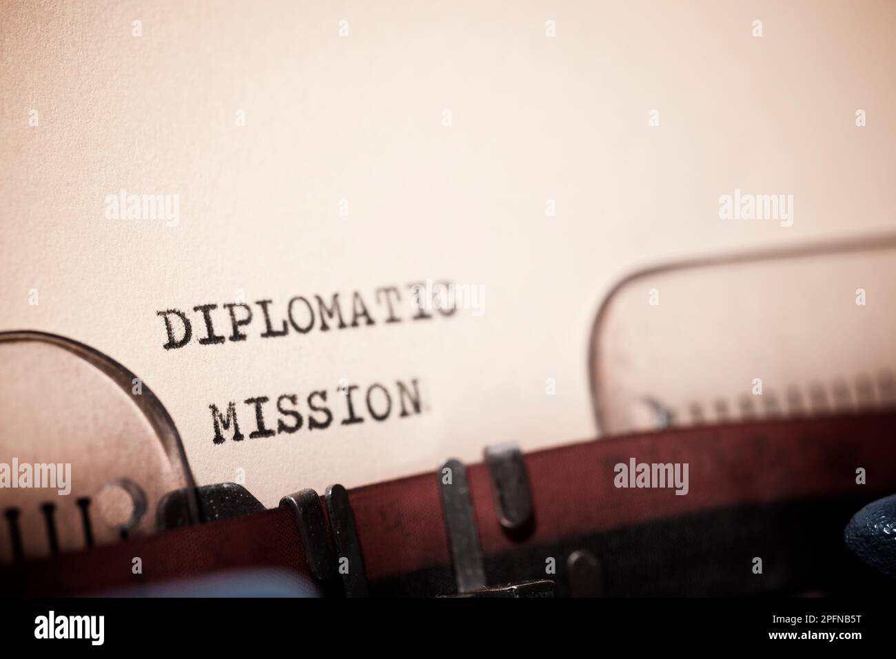 Diplomatic mission text written with a typewriter Stock Photo - Alamy