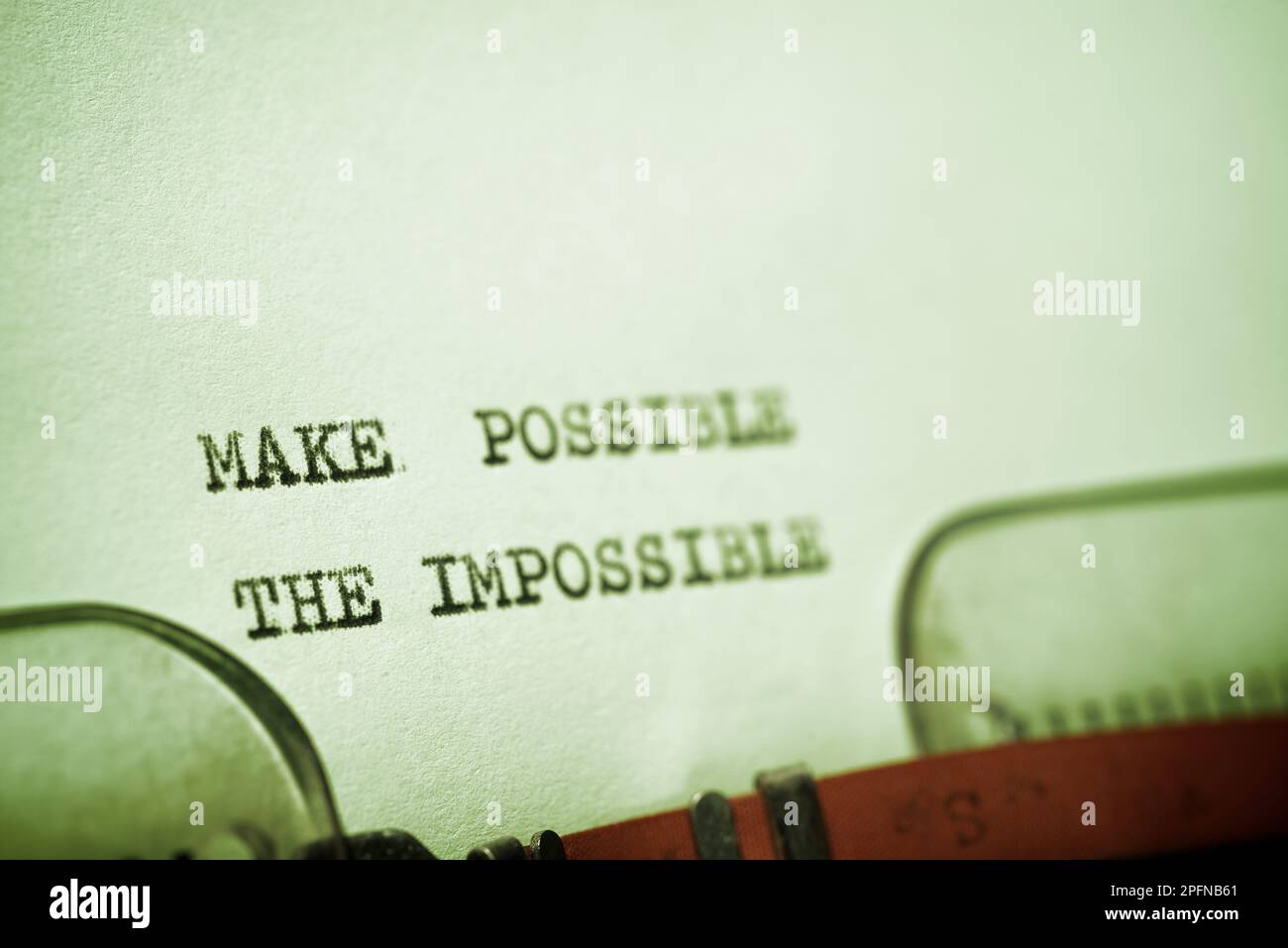 Make possible the impossible text written with a typewriter Stock Photo ...