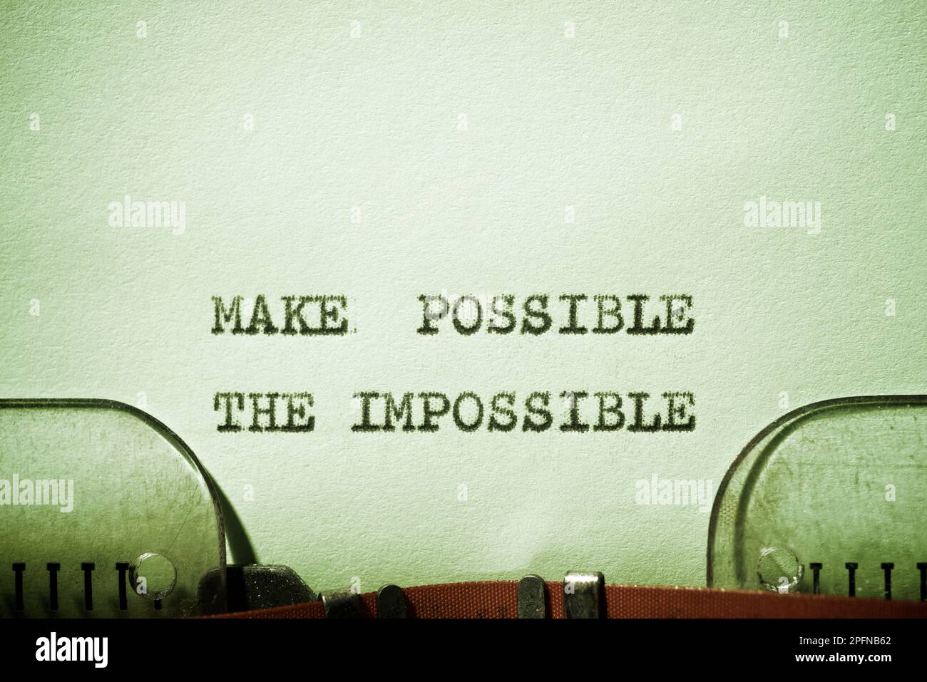Make possible the impossible text written with a typewriter Stock Photo ...