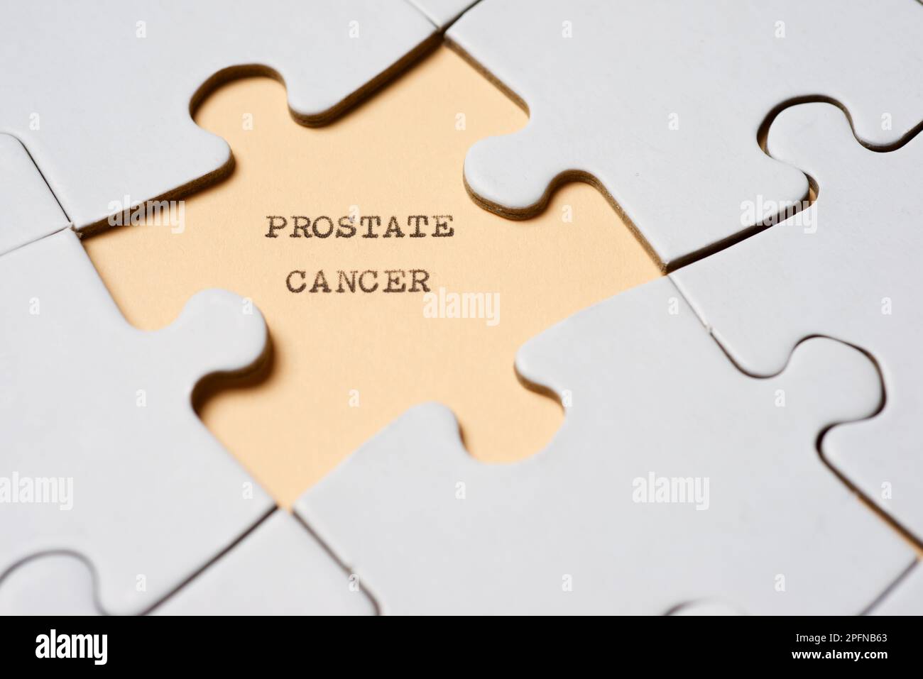 Prostate cancer text in a white puzzle Stock Photo - Alamy