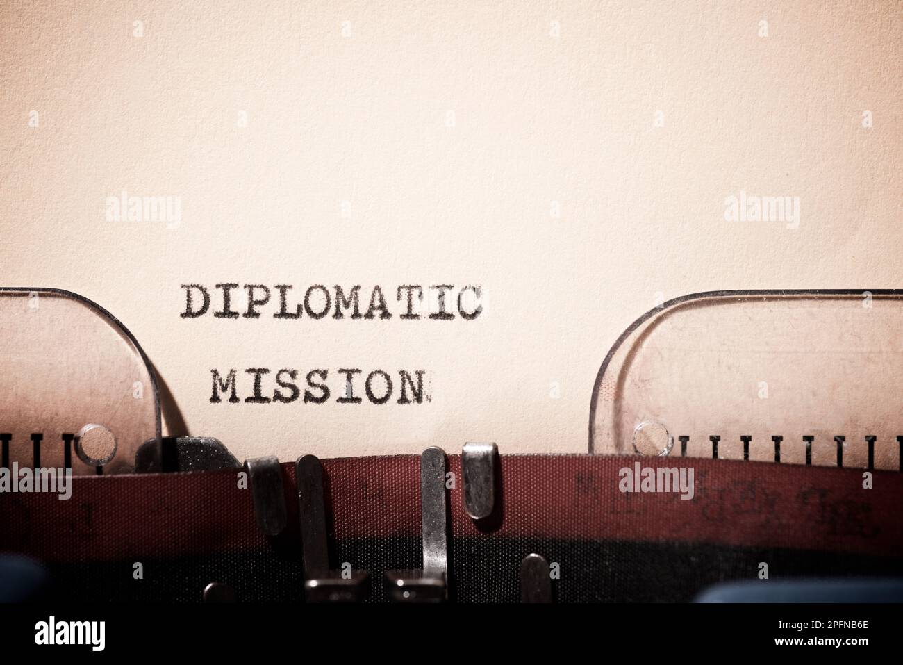 Diplomatic mission text written with a typewriter Stock Photo - Alamy