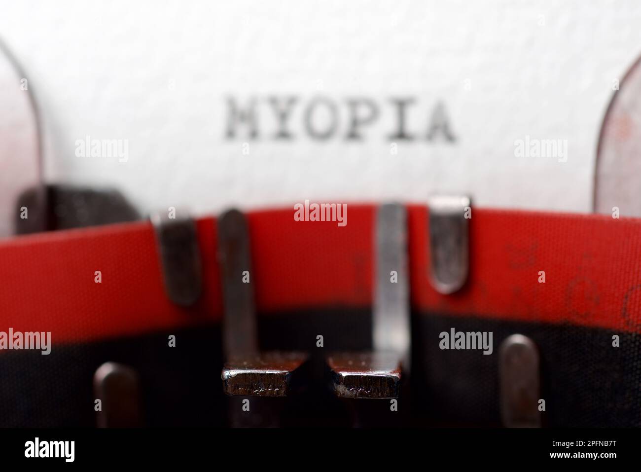 Myopia word written with a typewriter Stock Photo - Alamy