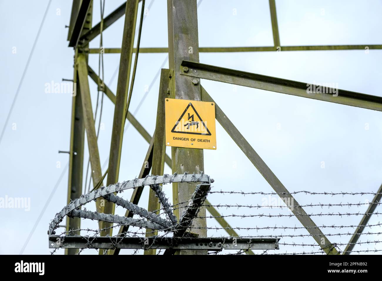Pylon with danger electricity notice hi-res stock photography and ...