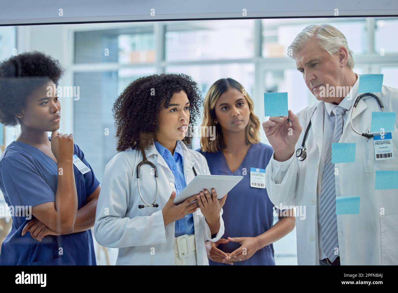Planning, training and doctors or people on glass board for workflow ...