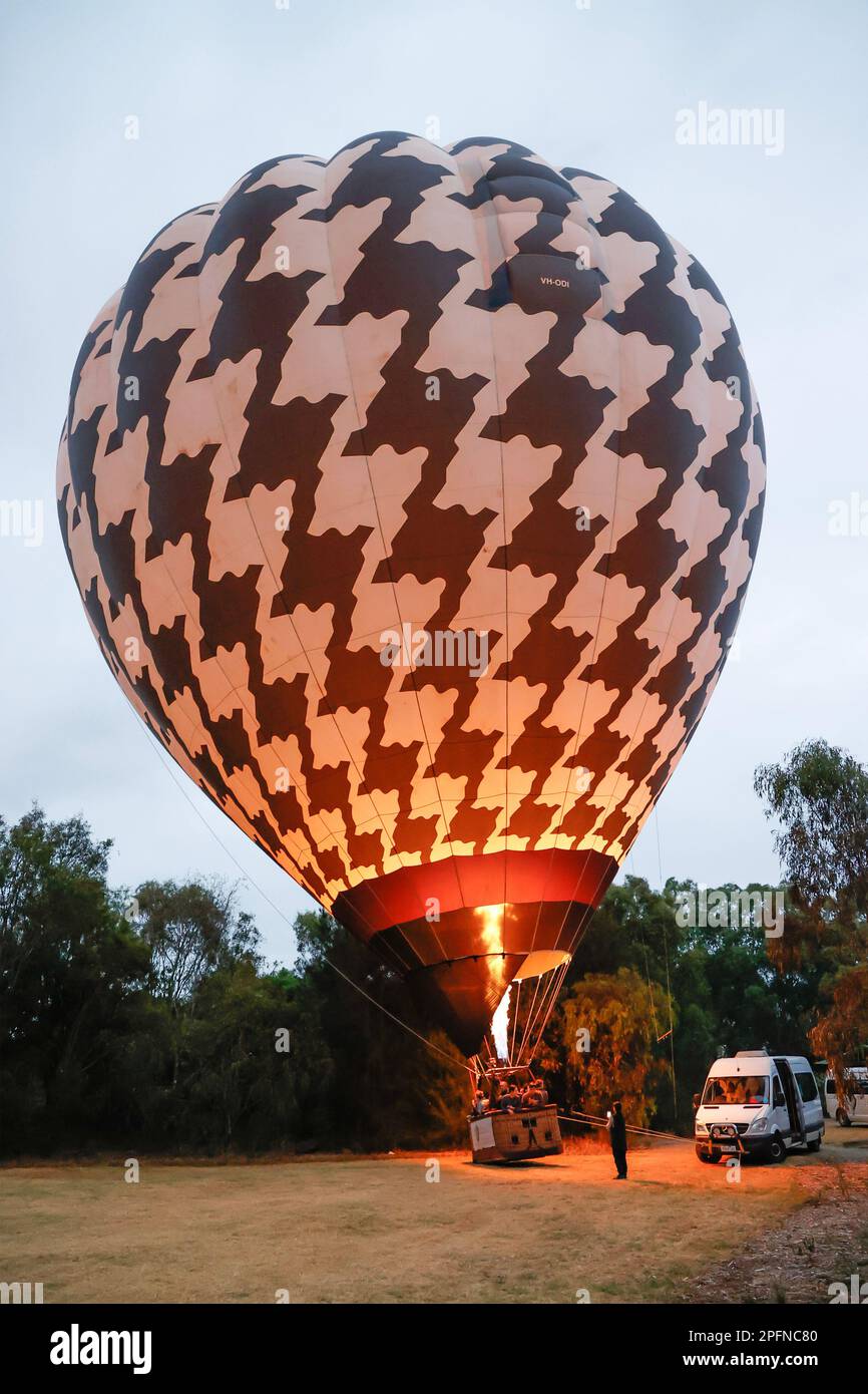 Burners firing up hot air into a balloon in preparation for take off in ...