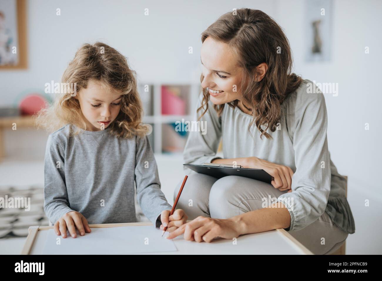 Shy child classroom hi-res stock photography and images - Alamy