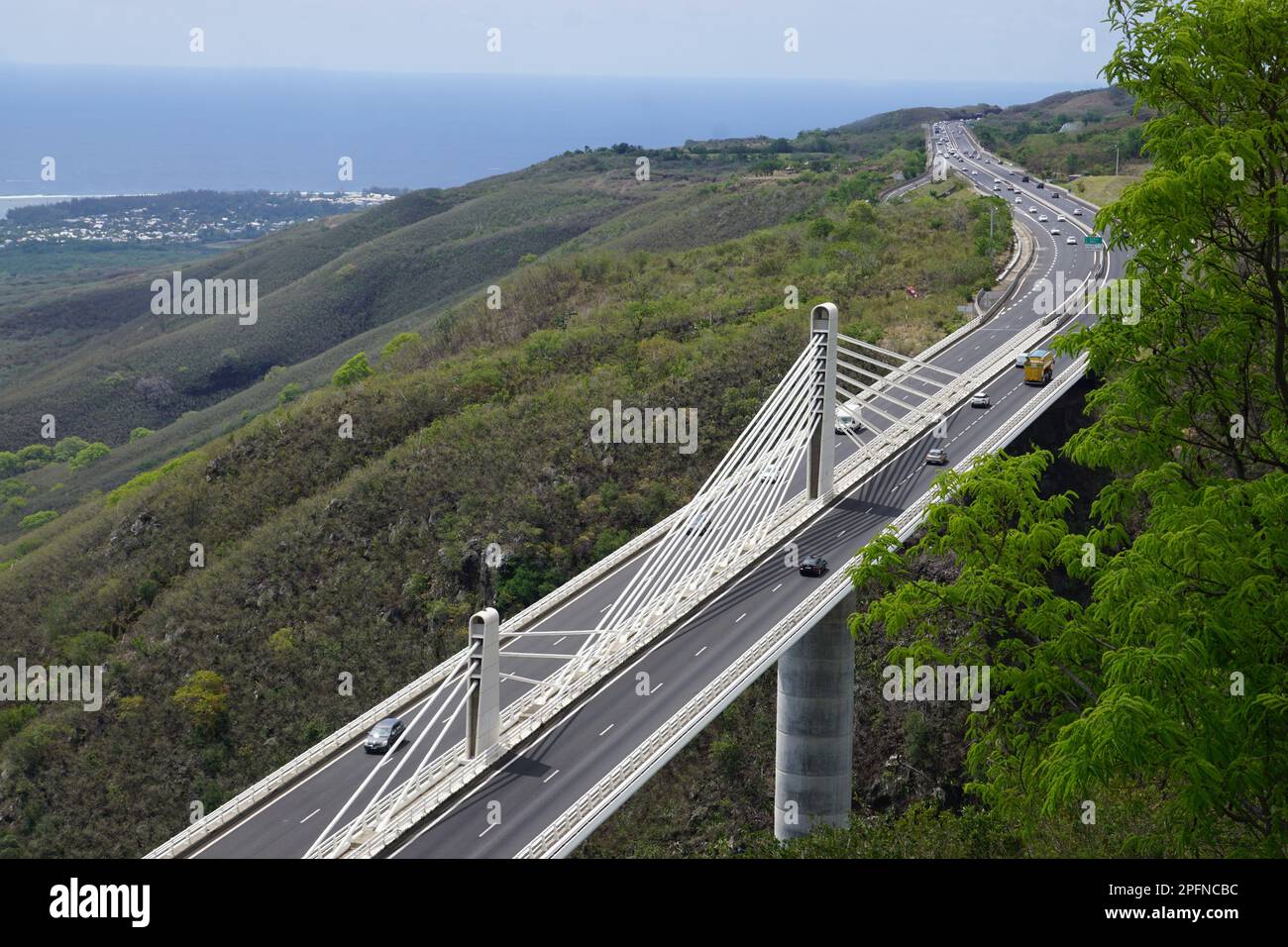 landscape scene of the ocean and highway bridge on the tropical island ...