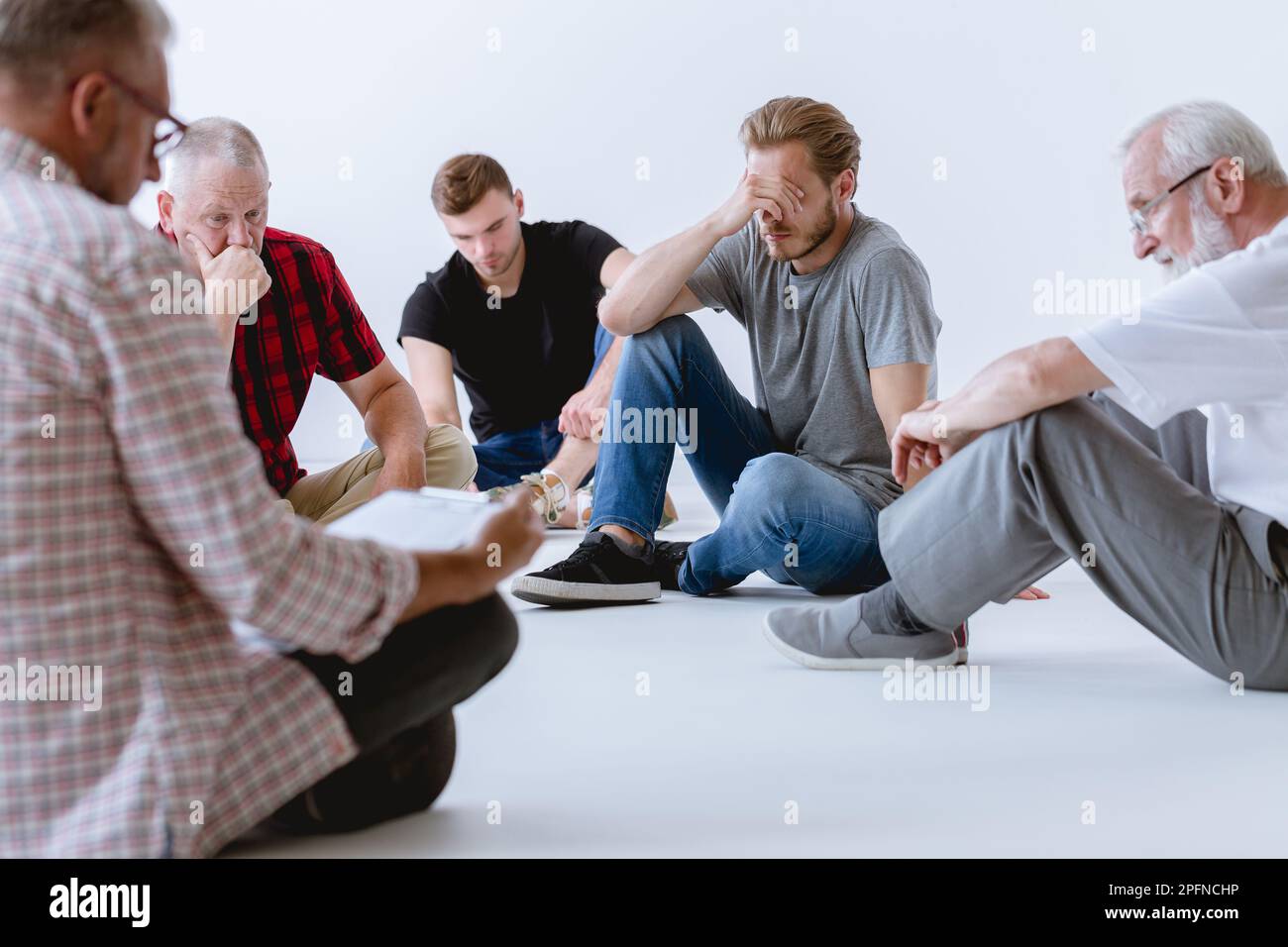 Group psychotherapy for men with different problems and issues Stock ...