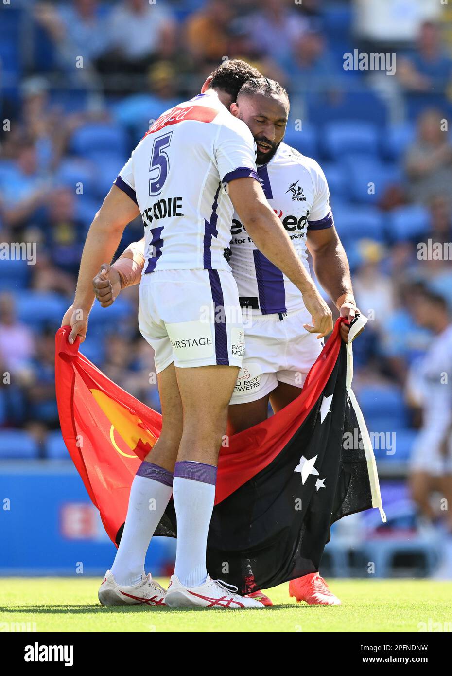 Storm players Xavier Coates (left) and Justin Olam enter the field of ...
