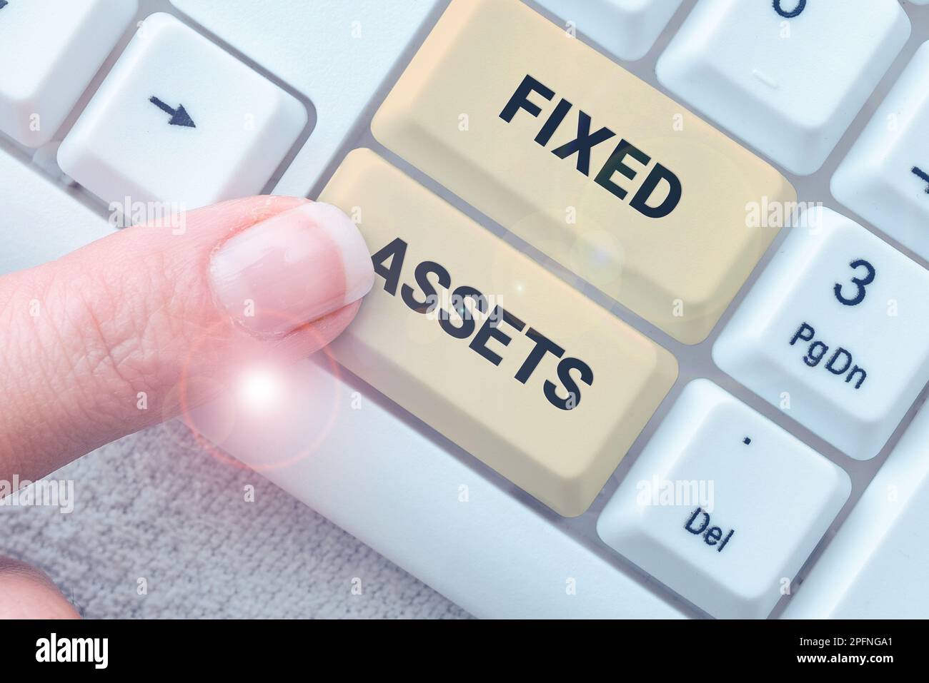 Conceptual display Fixed Assets. Word Written on long-term tangible ...