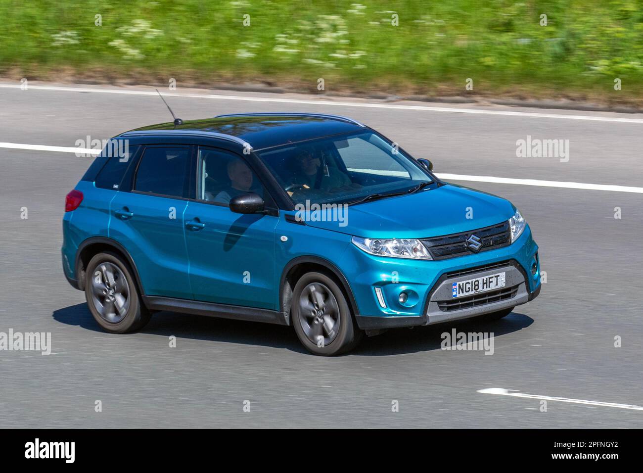 2018 (18) Blue Turquoise SUZUKI VITARA SX-T Auto; travelling on the M61 ...