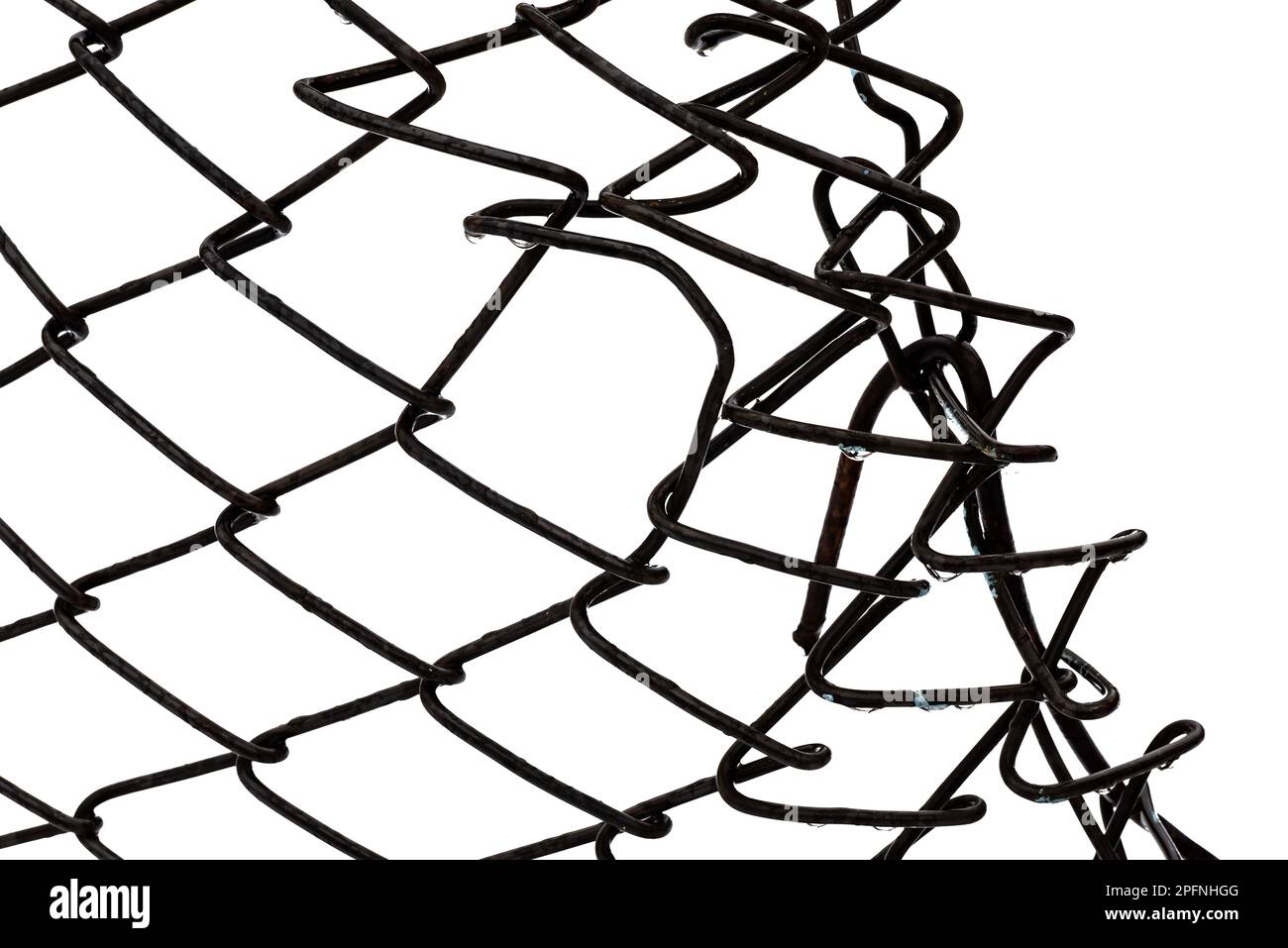 The texture of the metal mesh. Torn, destroyed, broken metal mesh on a ...