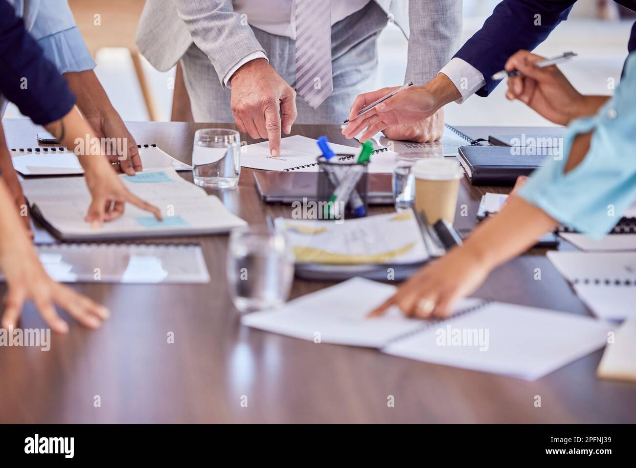 Documents, hands or business people pointing in meeting with teamwork ...