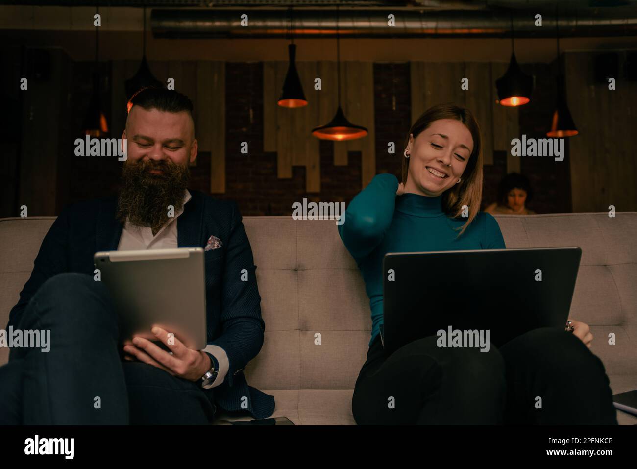 Beautiful business partners having fun conversation while working ...