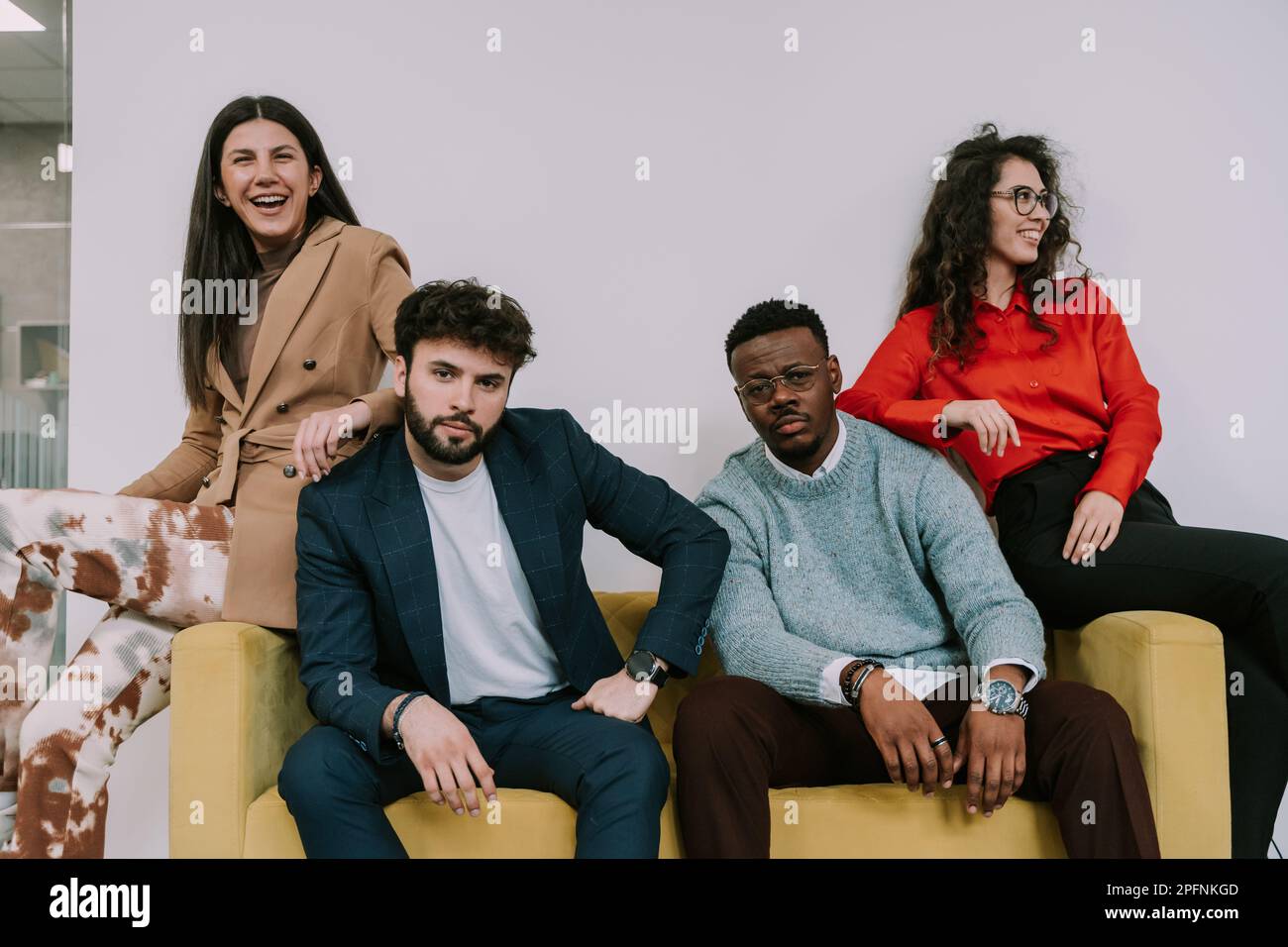 A front view photo of lovely multiracial business couples posing and ...