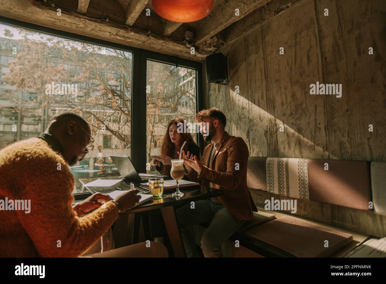 Worried, disappointed ginger woman trying to solve her daily task while ...