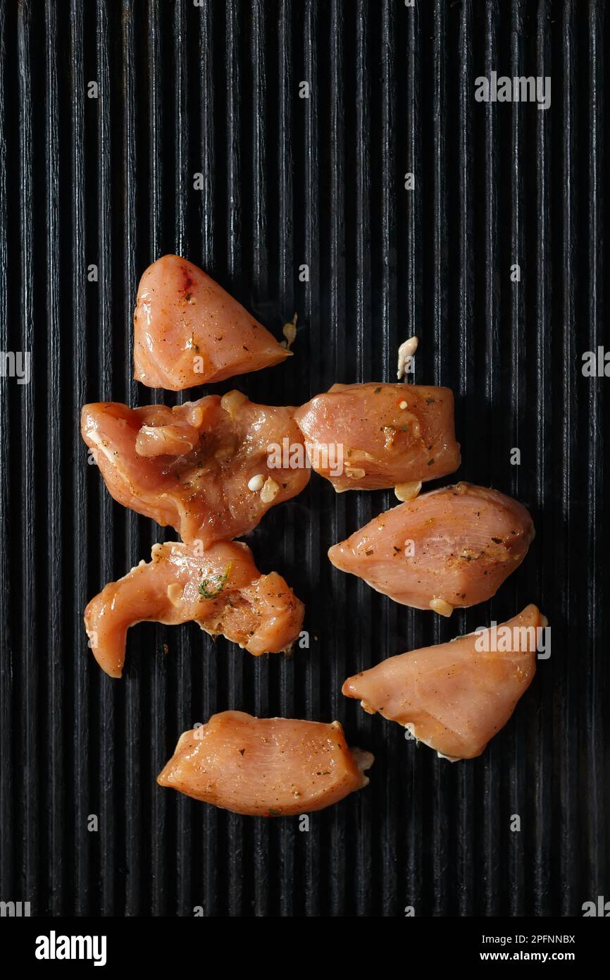 Process cooking chicken fillet grill hi-res stock photography and ...