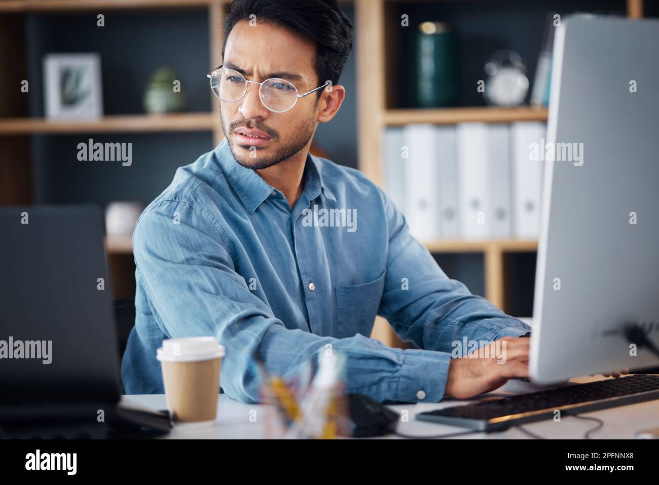 Asian software developer typing on hi-res stock photography and images ...