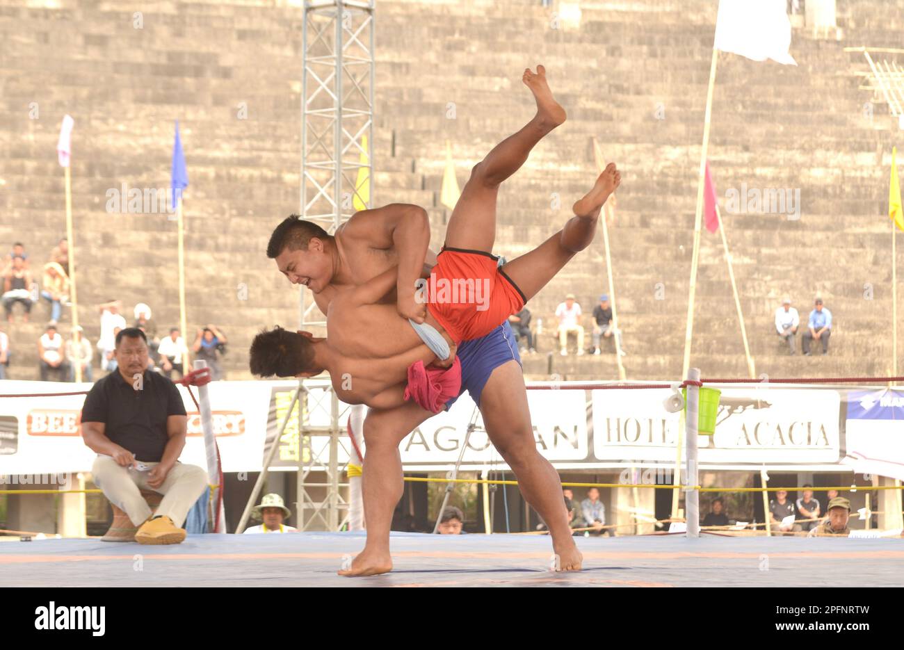 Dimapur, India. 18th Mar, 2023. Naga Wrestlers compete in a bout during ... Dimapur, India. 18th Mar, 2023. Naga Wrestlers compete in a bout during ...