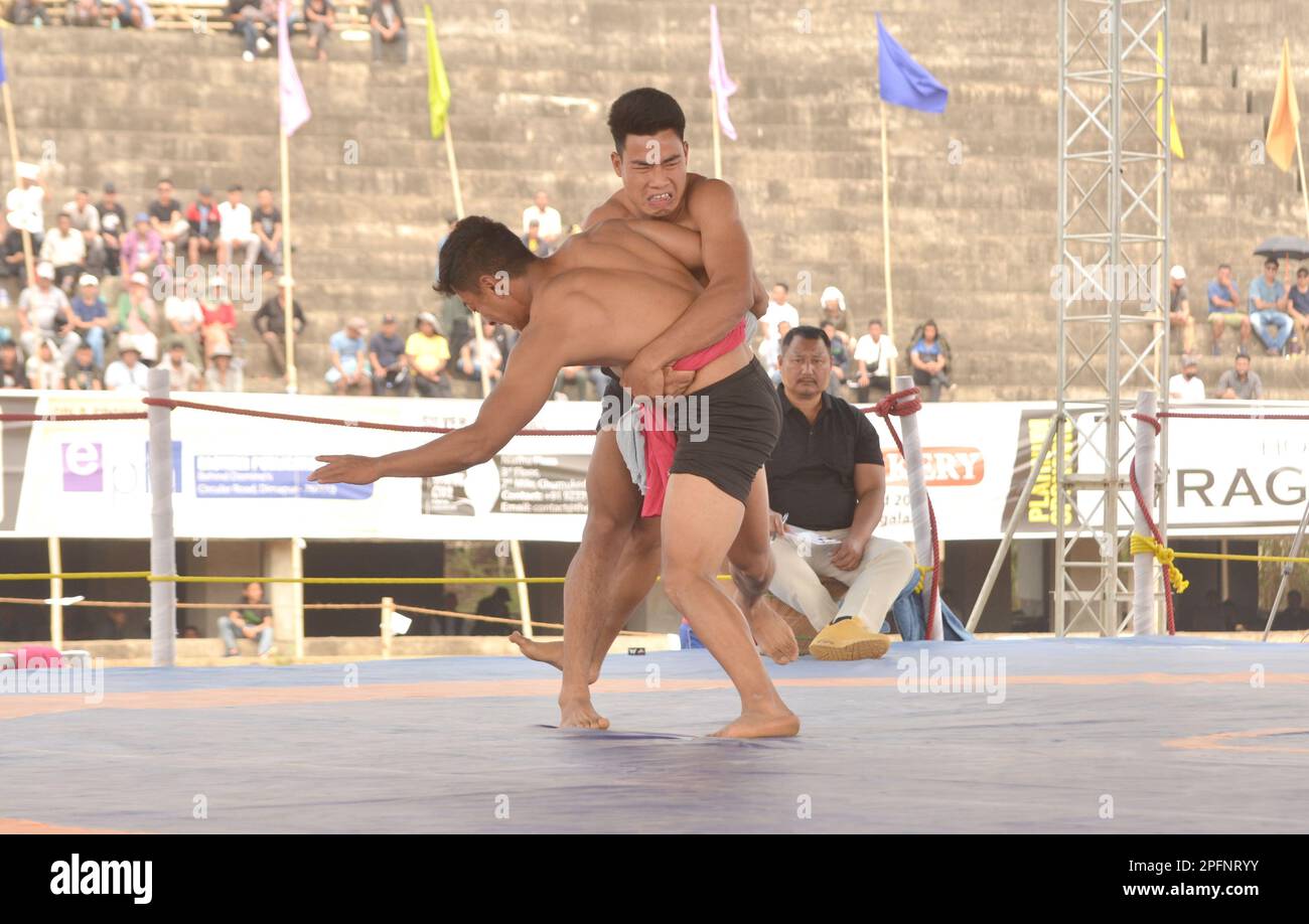 Dimapur, India. 18th Mar, 2023. Naga Wrestlers compete in a bout during ...