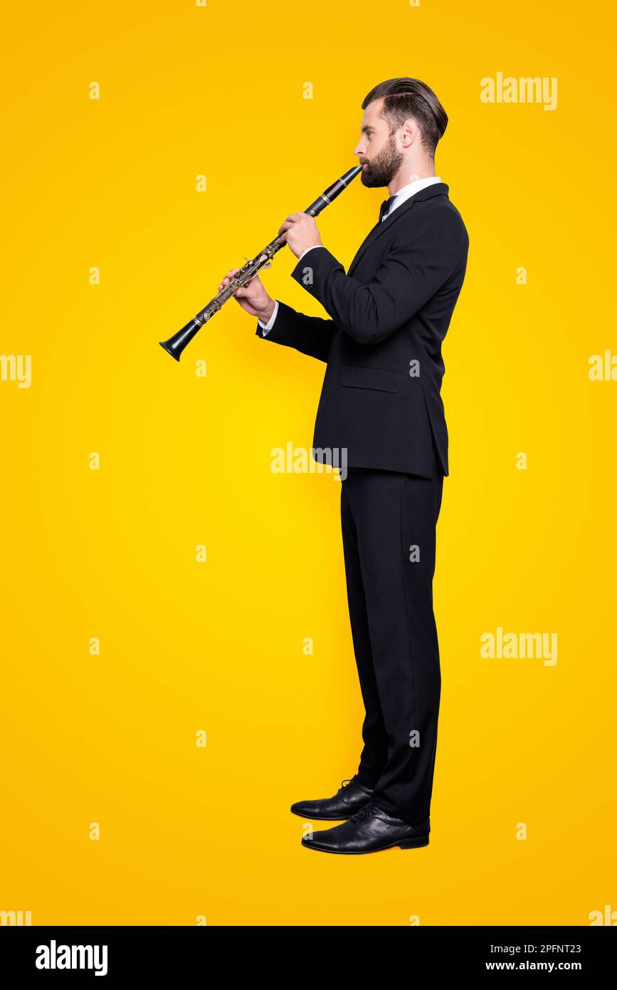 Side view half face, full size fullbody portrait of stylish talented ...