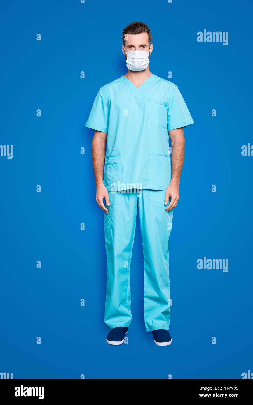 Full size fullbody portrait of attractive handsome man in sterile mask ...
