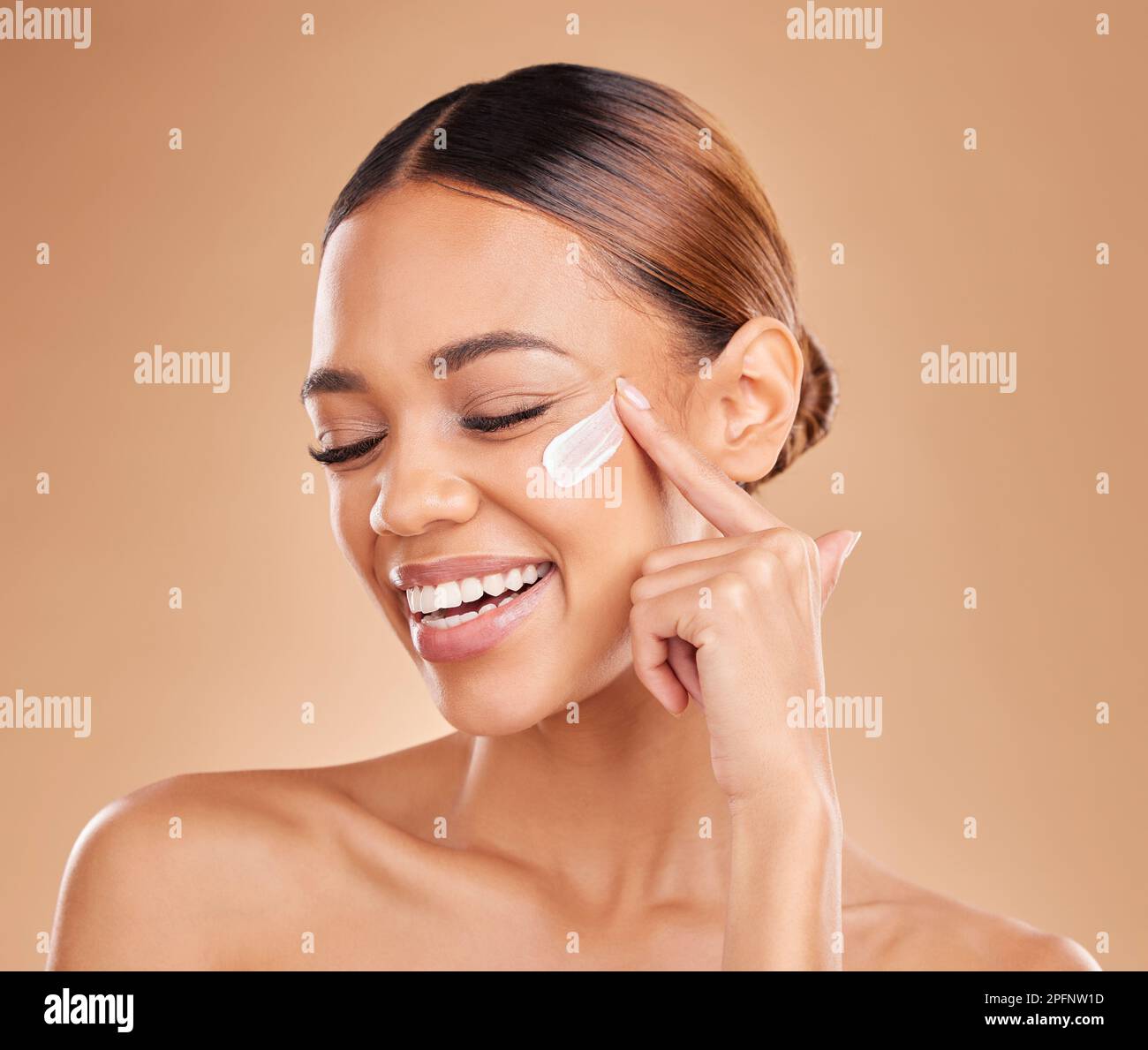 Funny, face skincare and woman with cream in studio isolated on a brown ...