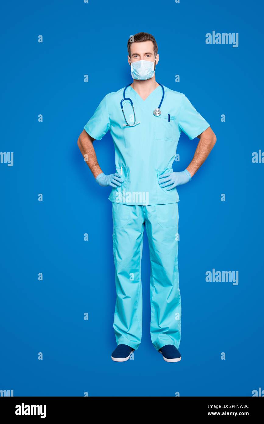 Full size body portrait of attractive handsome man in sterile mask and ...