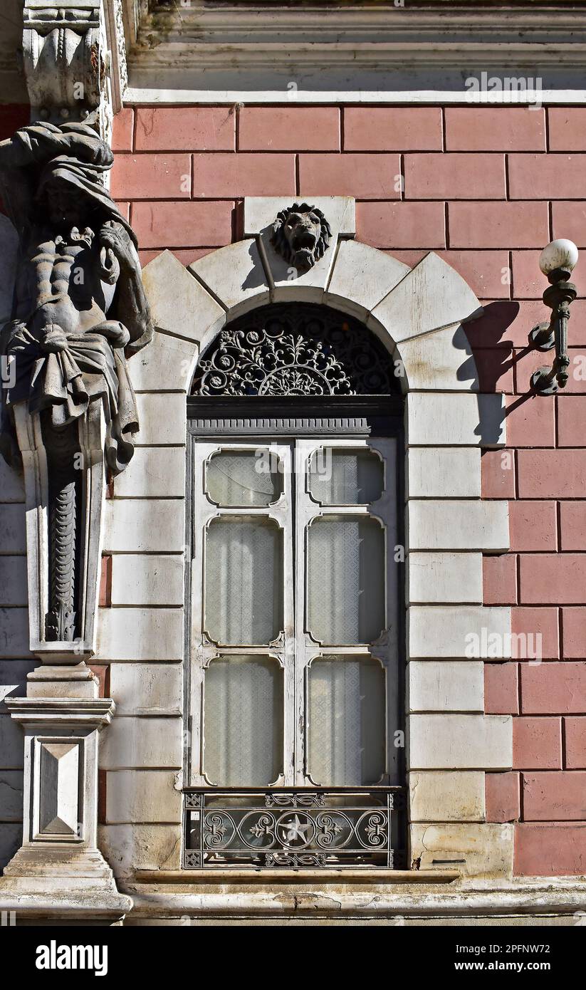 Ancient facade with window and sculpture in Petropolis, Rio de Janeiro ...