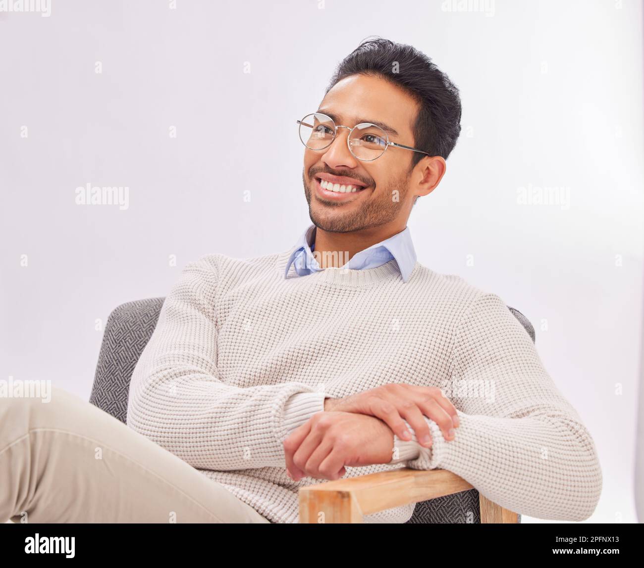 Psychologist thinking, mental health and man with smile in therapy and ...