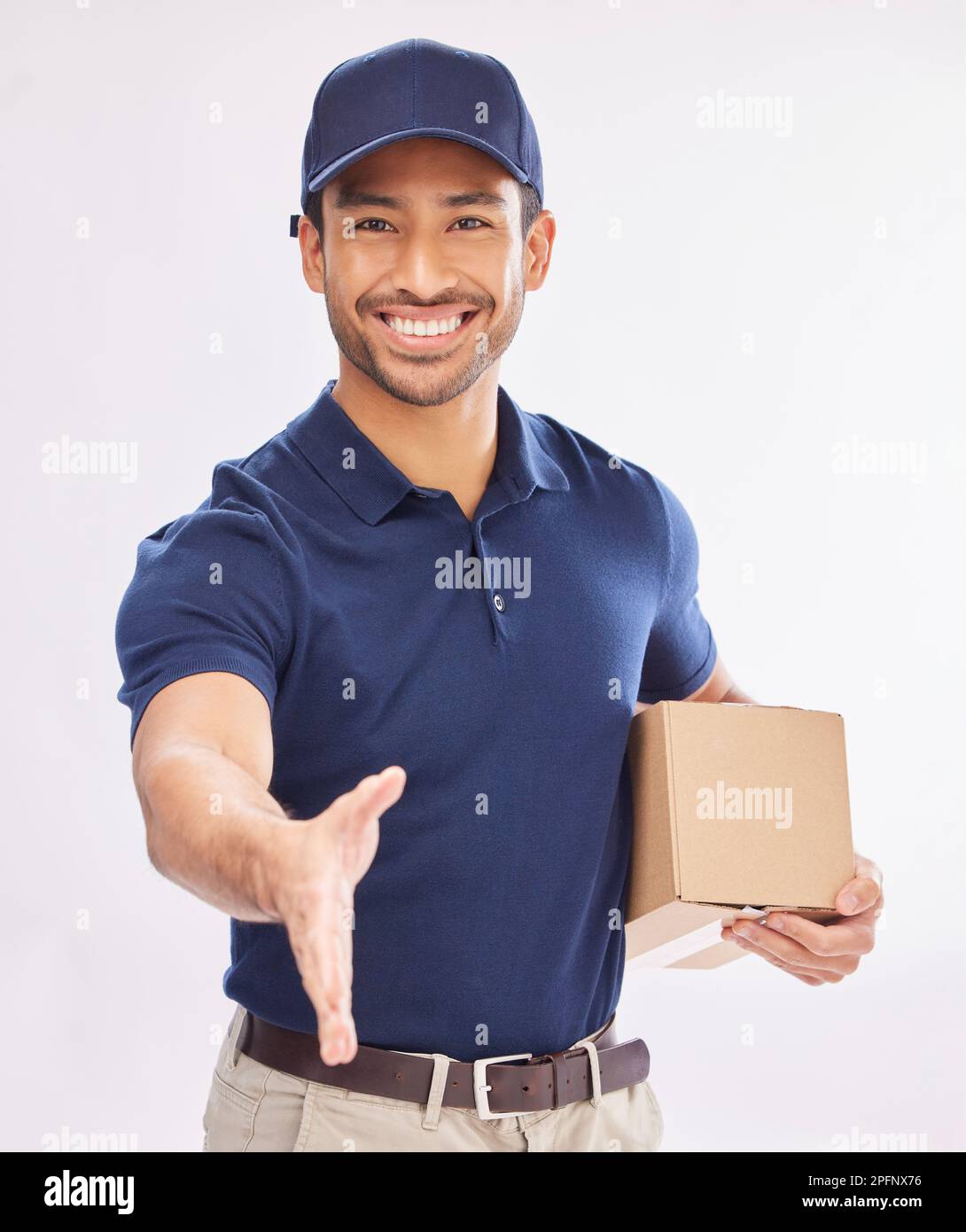 Box, portrait smile and delivery man with handshake in studio isolated ...