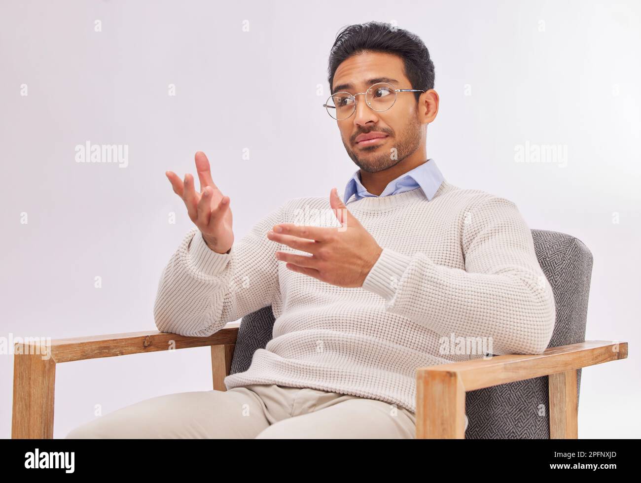 Psychologist, doctor and mental health, man in counselling session and listening with treatment ...