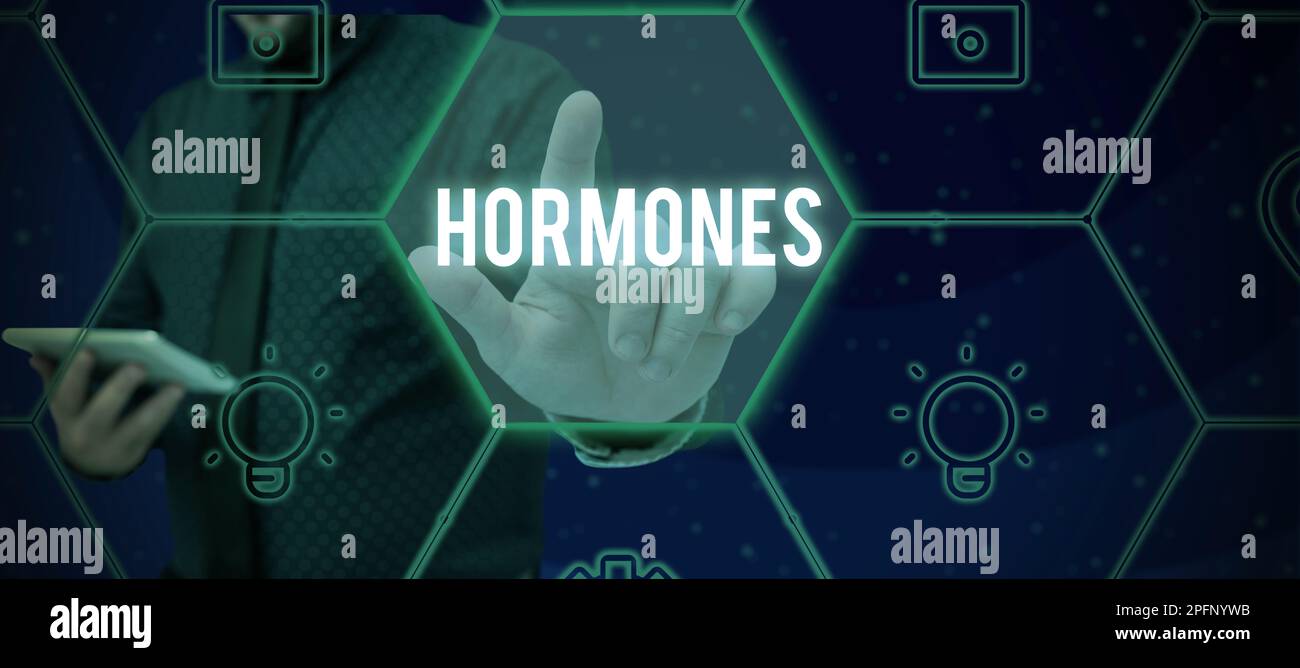Hand writing sign Hormones. Word Written on regulatory substance ...