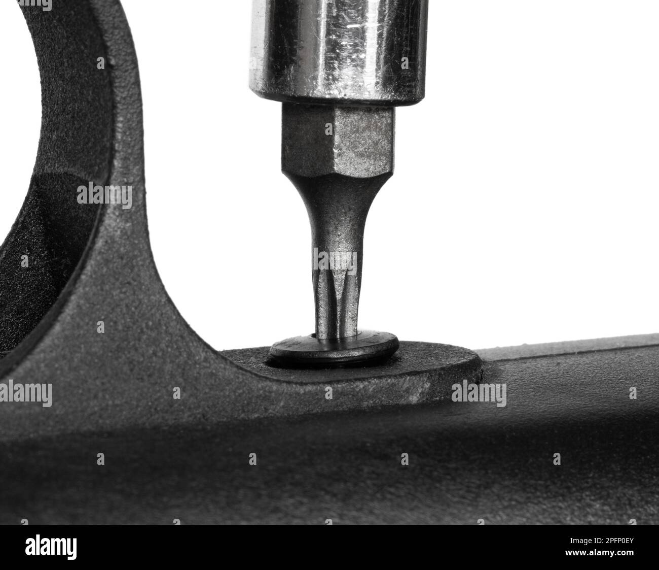 Star headed screwdriver removing a trigger guard on a rifle Stock Photo ...
