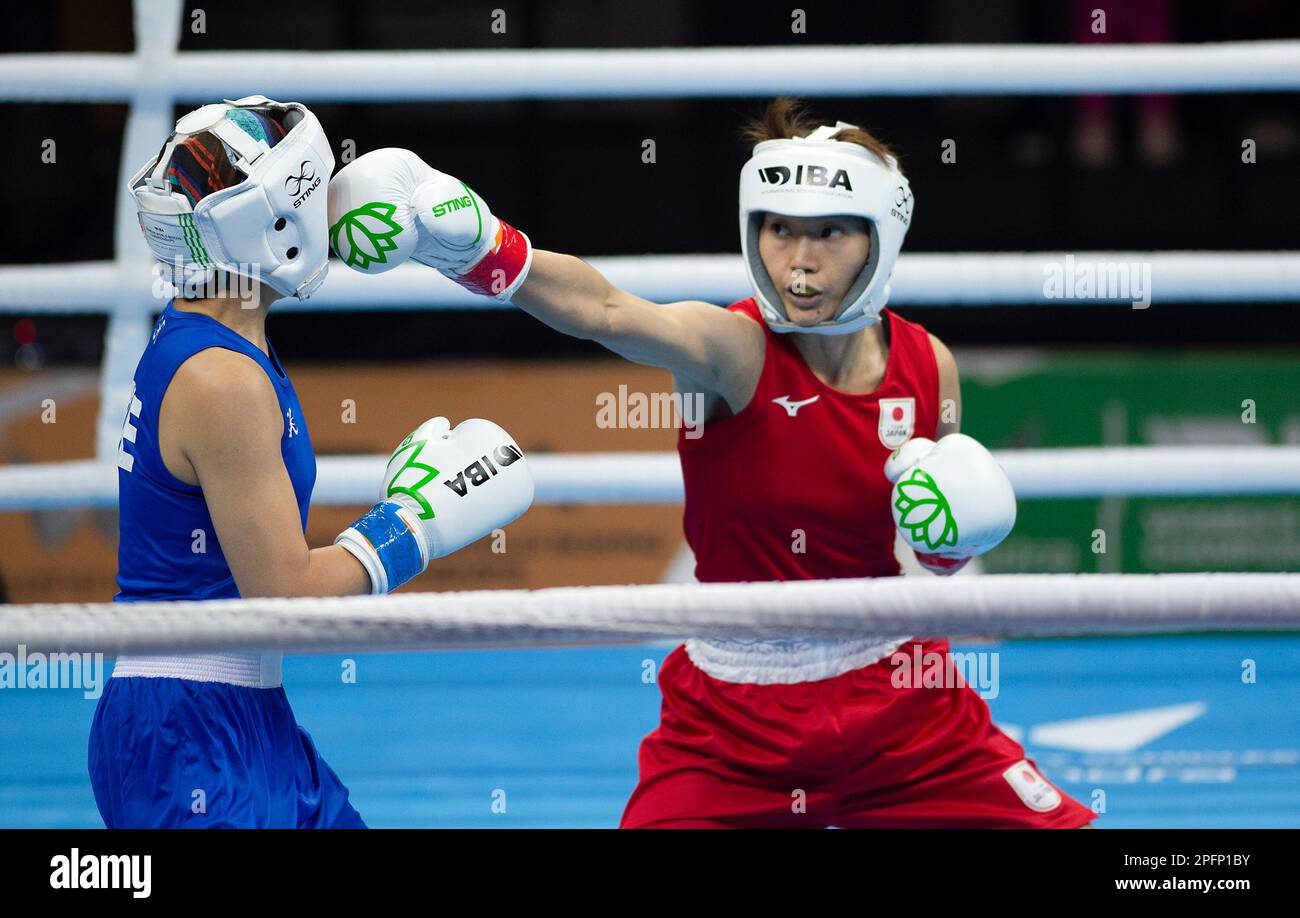 New Delhi, India. 18th Mar, 2023. Wada Madoka (R) of Japan competes ...