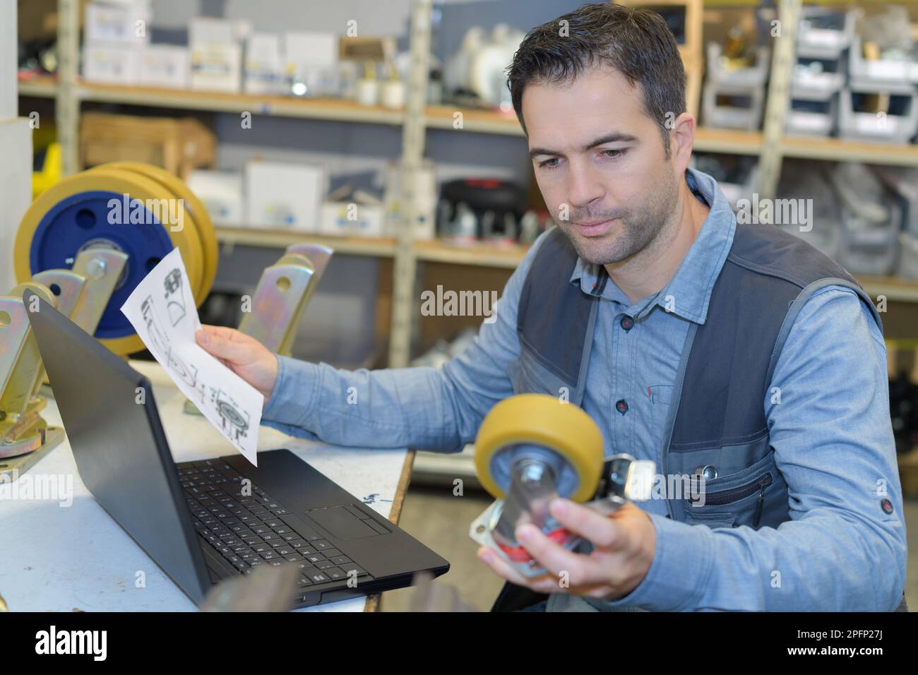 portrait of man working on gear mechanism design Stock Photo - Alamy