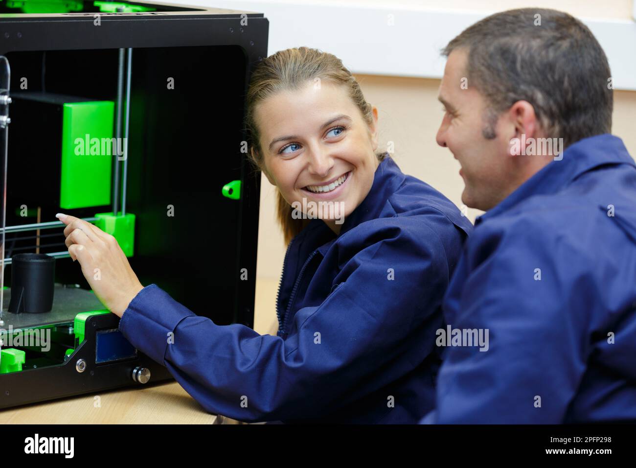 engineers work with a 3d printer Stock Photo - Alamy