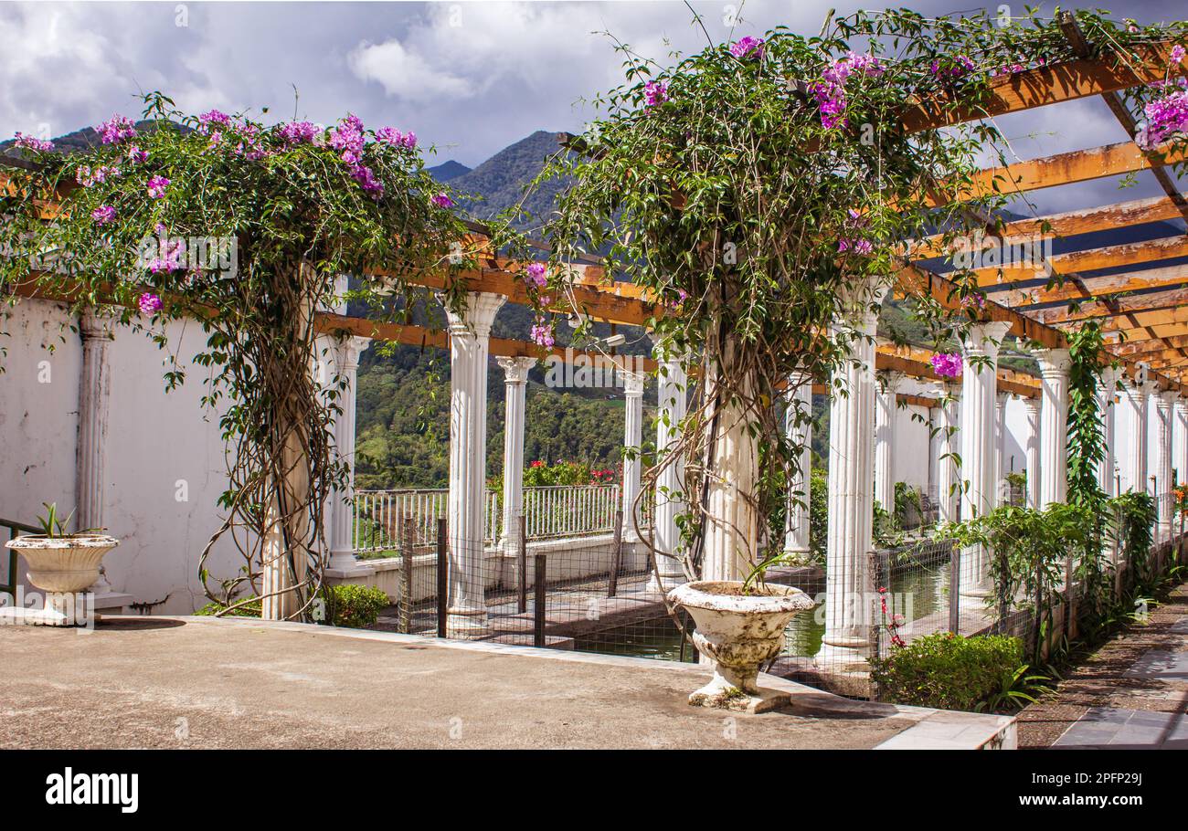 Beautiful pillars and landscaped garden with fountain in middle ...