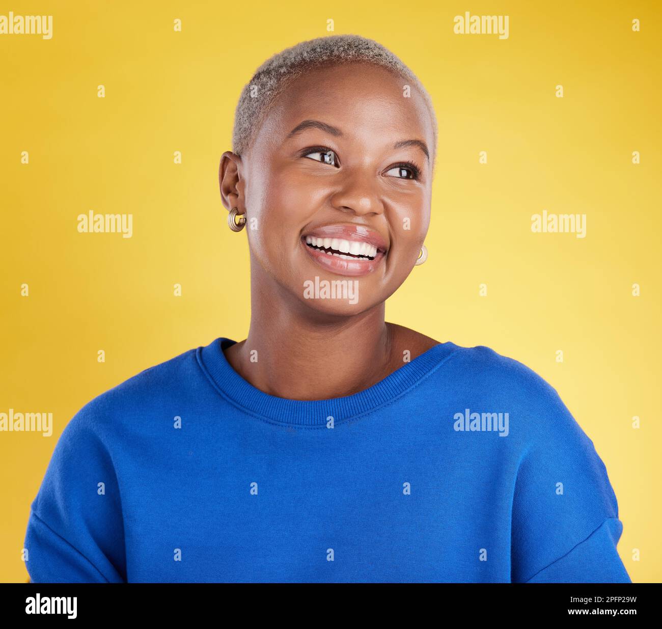 Thinking, smile and a black woman on a yellow background in a studio ...