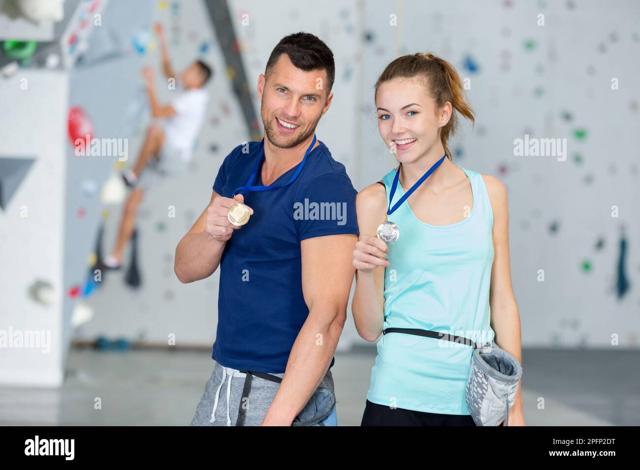 man and woman with gold medals Stock Photo - Alamy