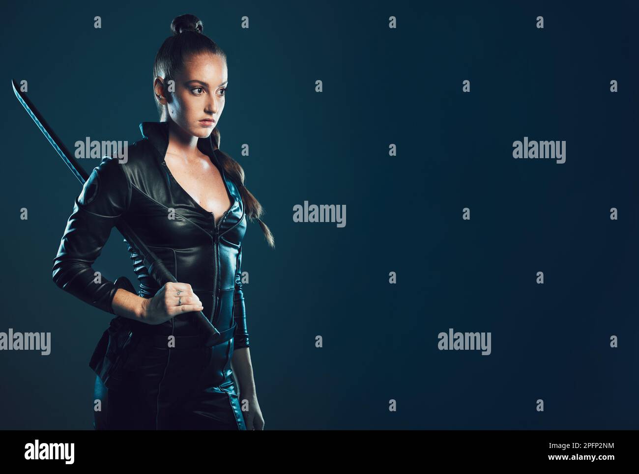 Woman, sword and assassin costume in studio with mock up space for ...