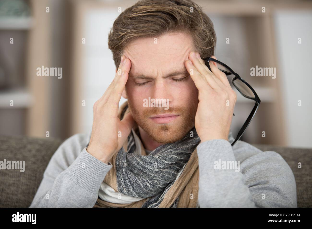 Squeezing head hi-res stock photography and images - Alamy