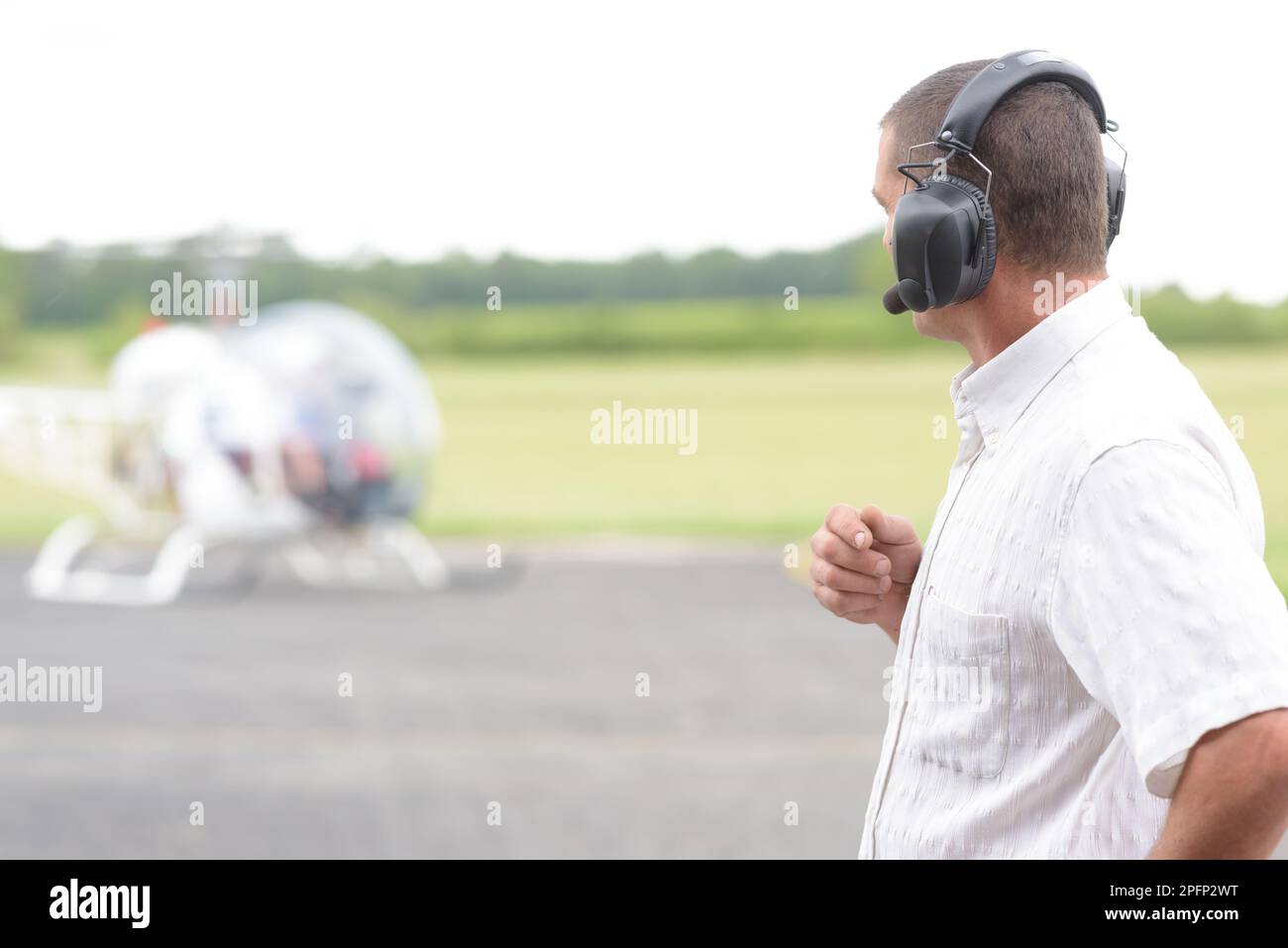 Man standing on helicopter hi-res stock photography and images - Alamy