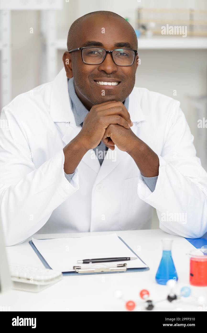 happy concentrated scientist in laboratory Stock Photo - Alamy