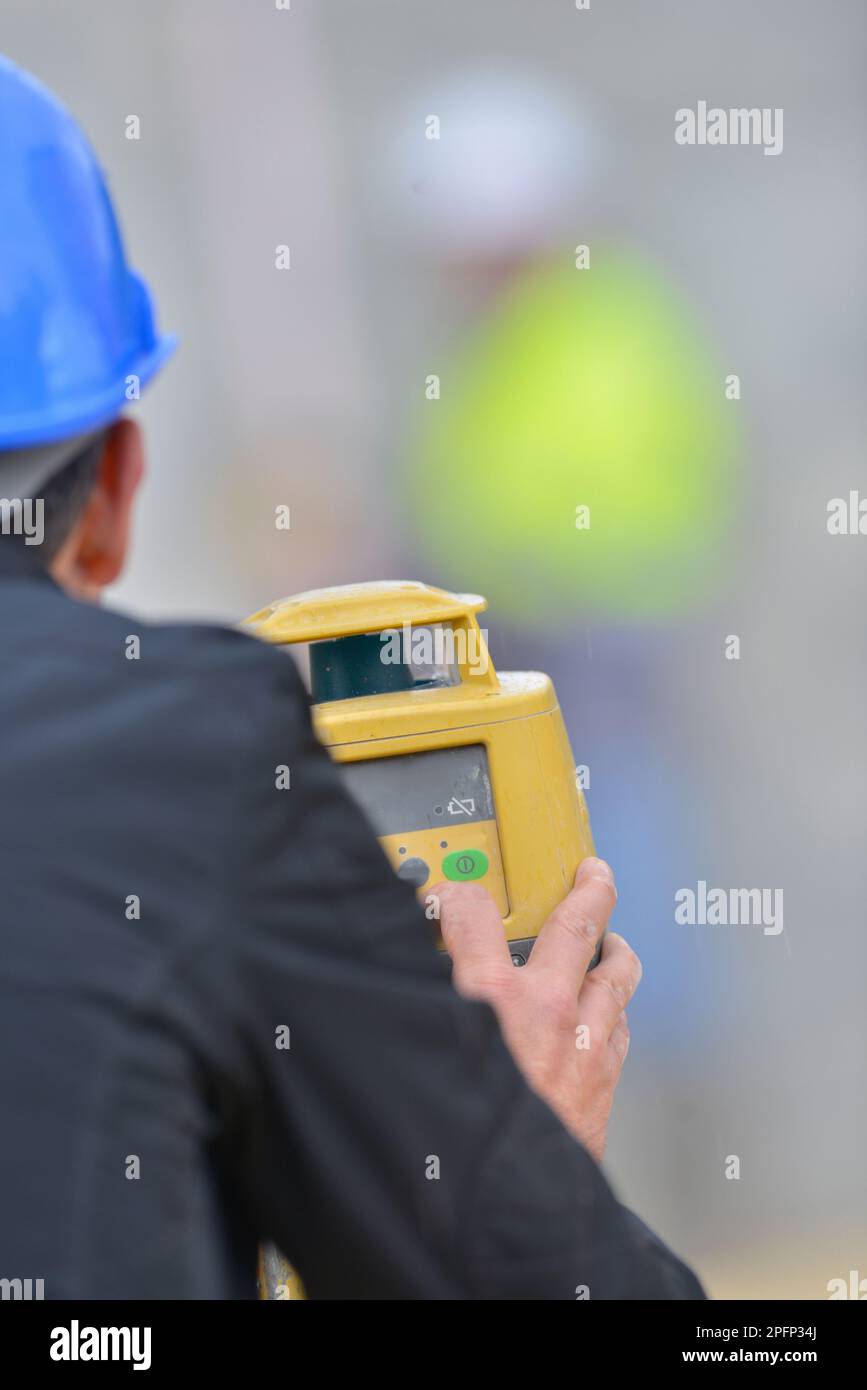 civil engineer measuring the road Stock Photo - Alamy