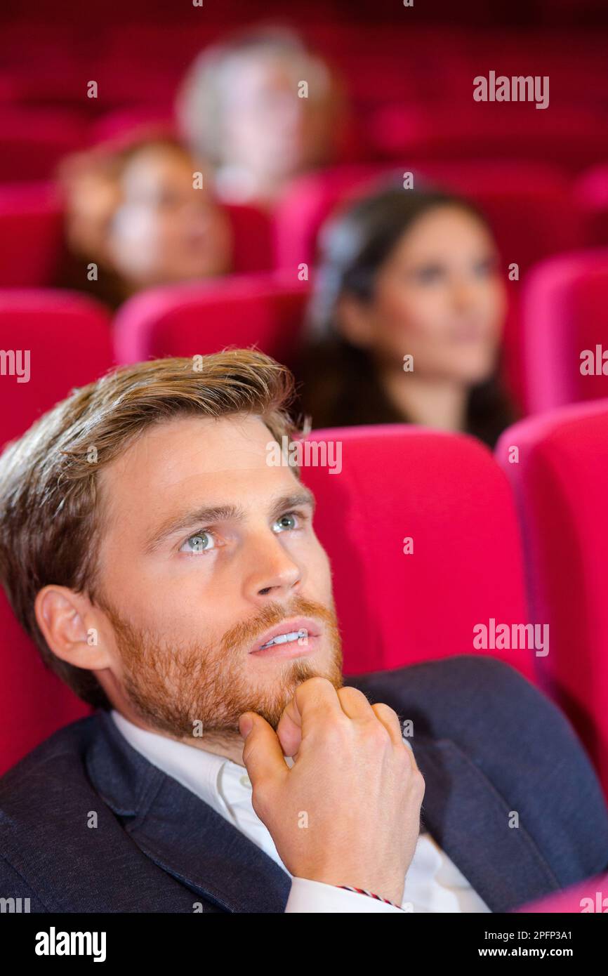 an audience watching a scene Stock Photo - Alamy