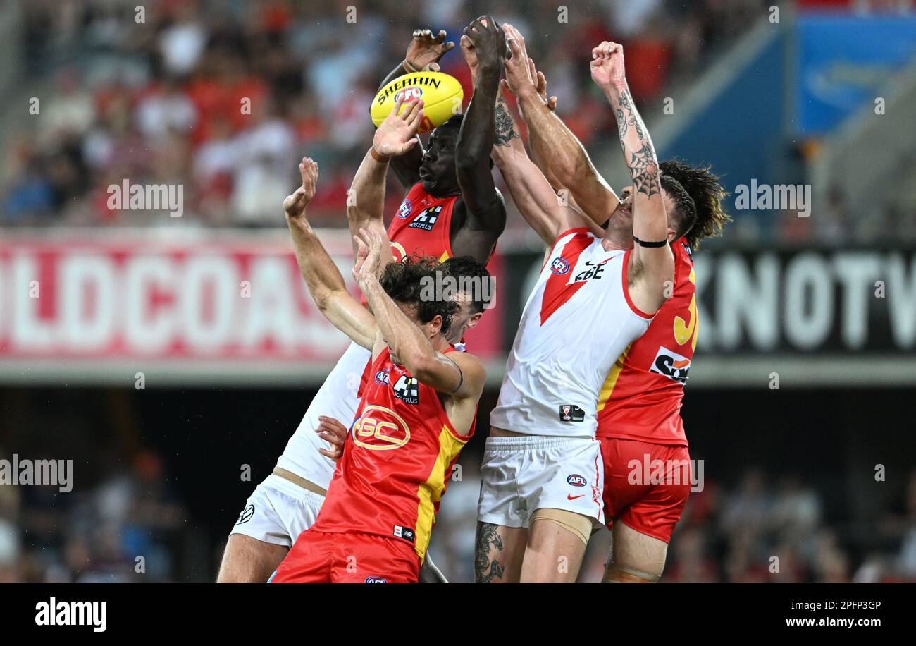 Mabior Chol (centre) of the Suns is seen in the middle of the pack during the AFL Round 1 match ...